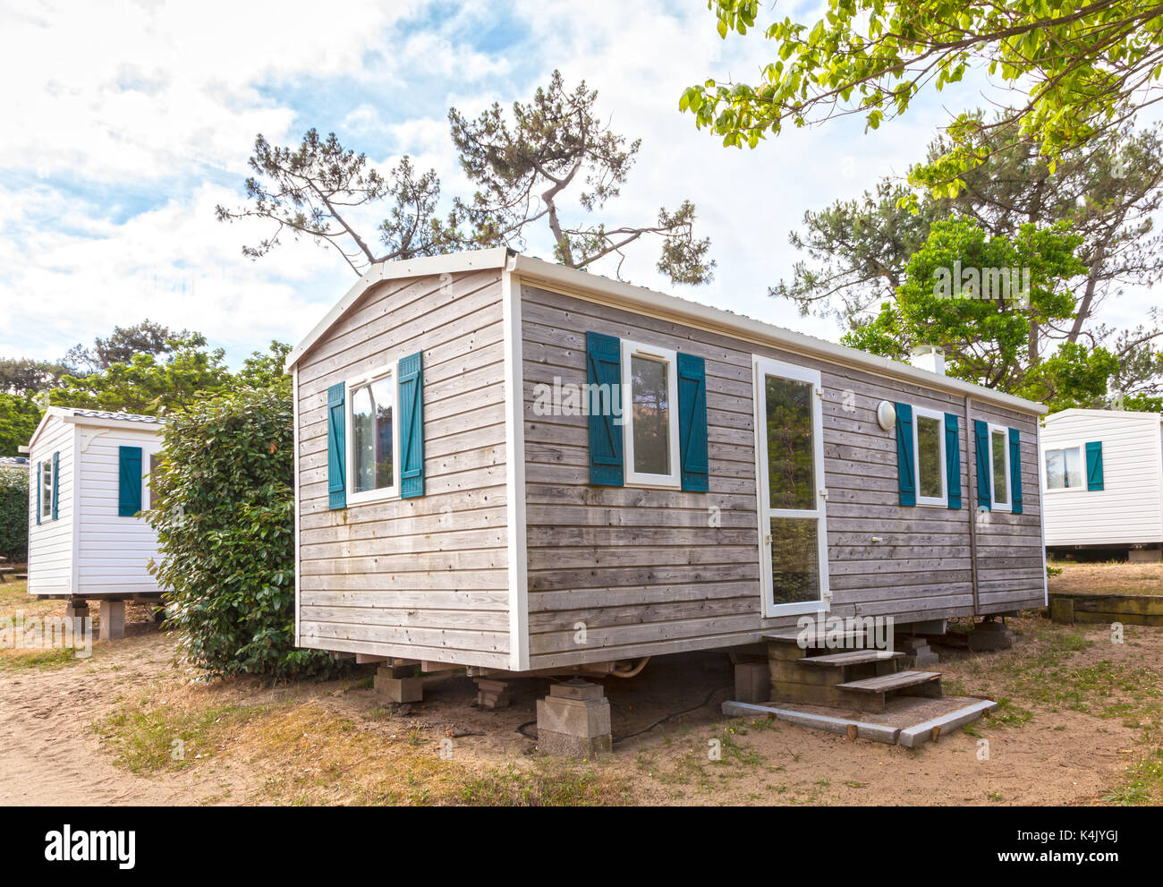 Summer vacation homes on a campsite Stock Photo - Alamy