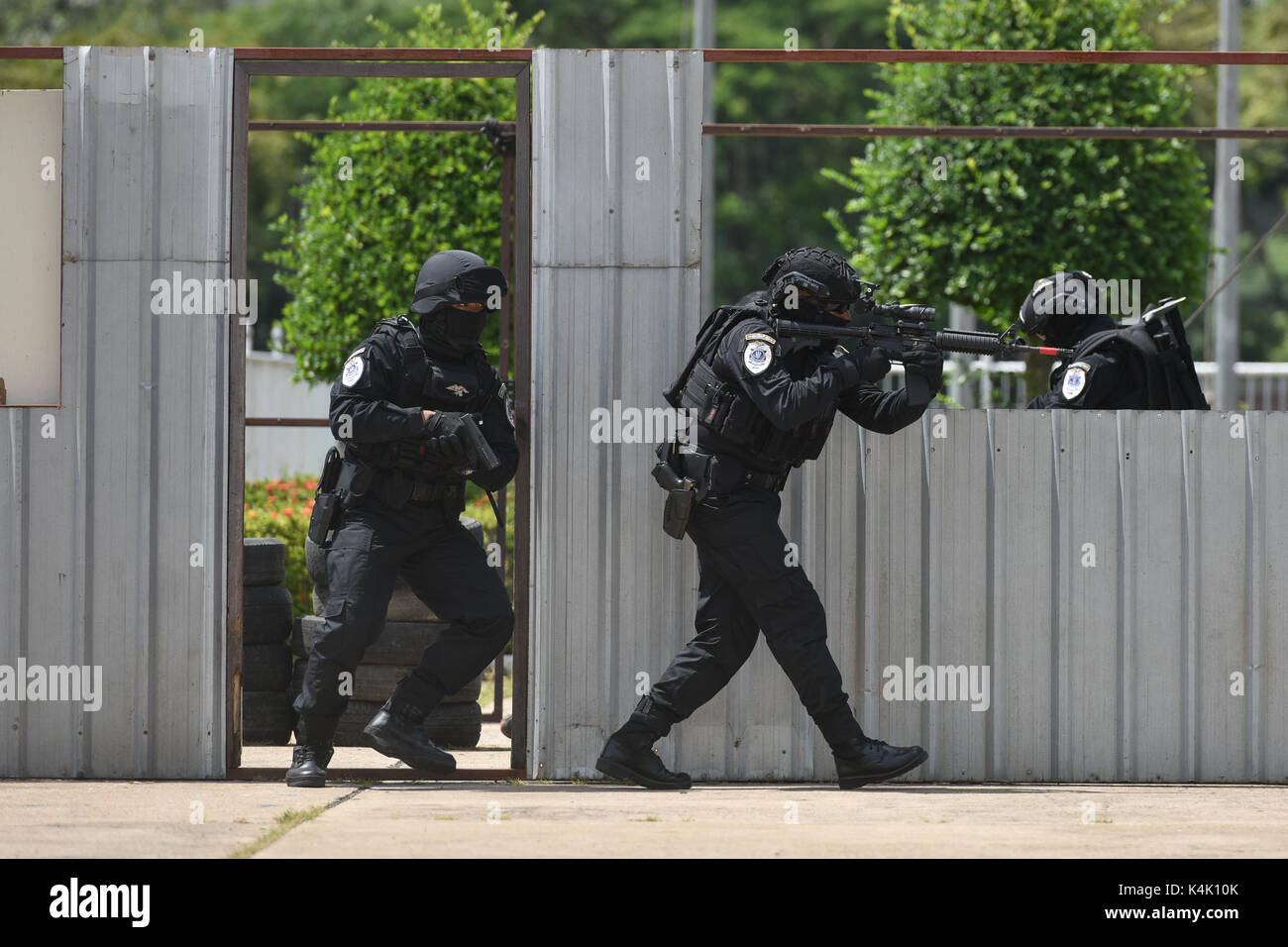 Nakhon Pathom. 6th Sep, 2017. Law enforcement officers search for "drug ...