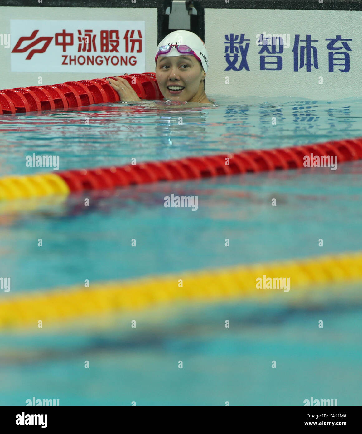 Tianjin. 6th Sep, 2017. Liu Xiang of Guangdong reacts after the women's ...