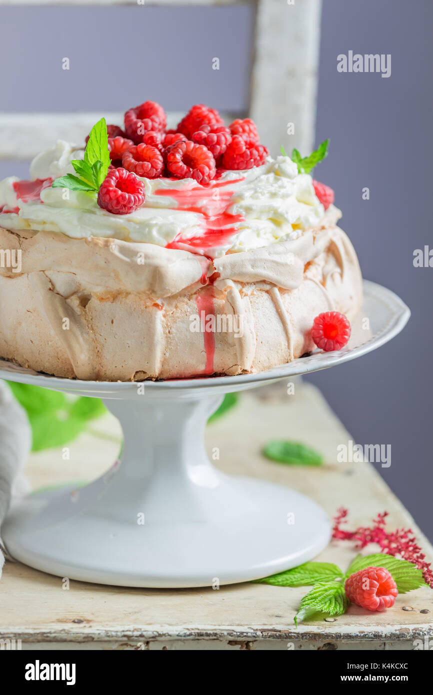 Delicious and crispy Pavlova cake with berries and meringue Stock Photo ...