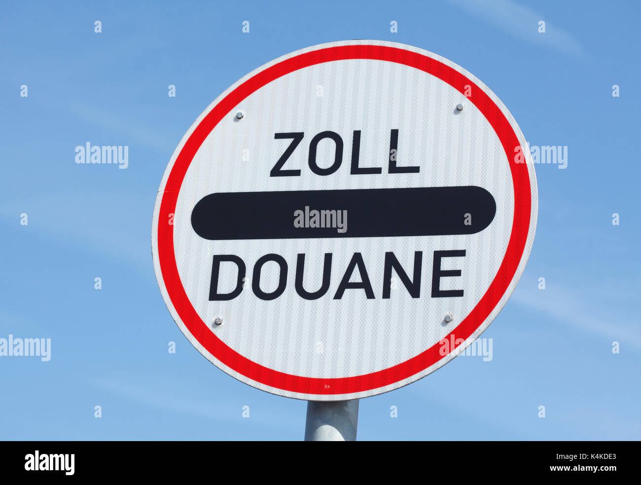 Border sign in front of blue sky, Customs, Douane, Freeport ...