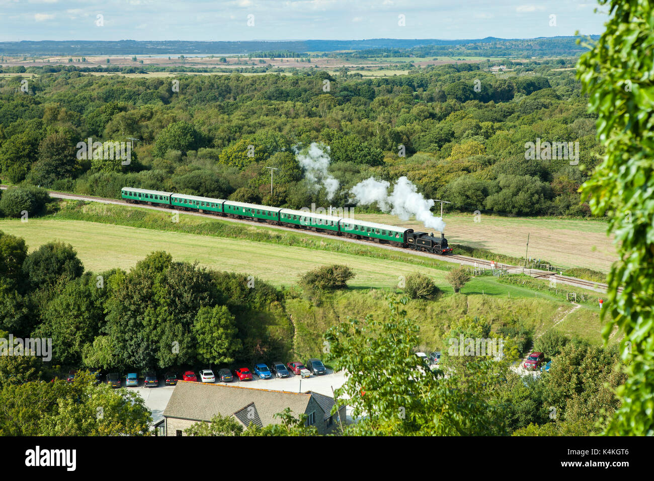 Steam train by Corfe Castle, on the Swanage railway line Steam train by ...