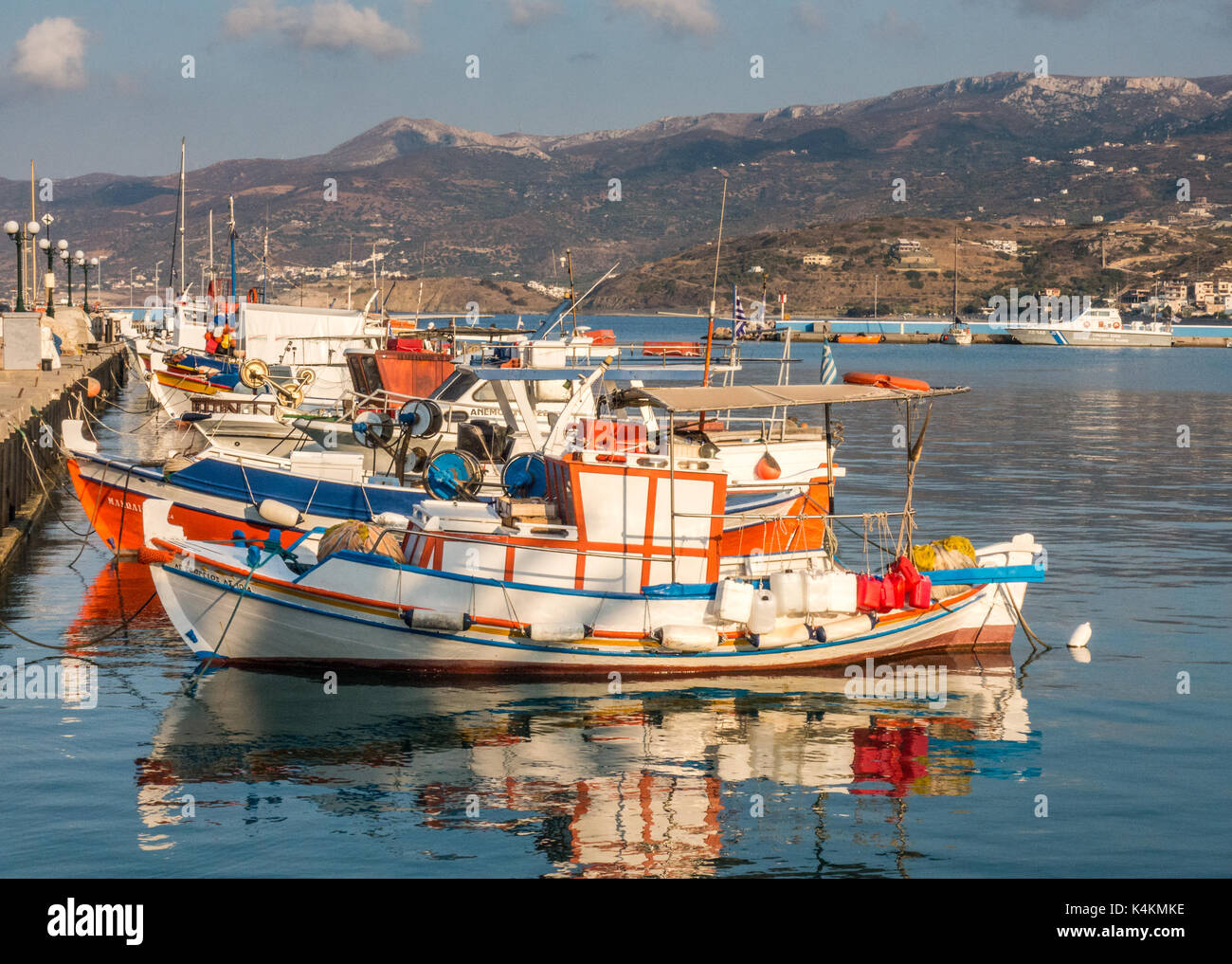 Colourful fishing boats moored in harbour of Sitia, eastern Crete ...