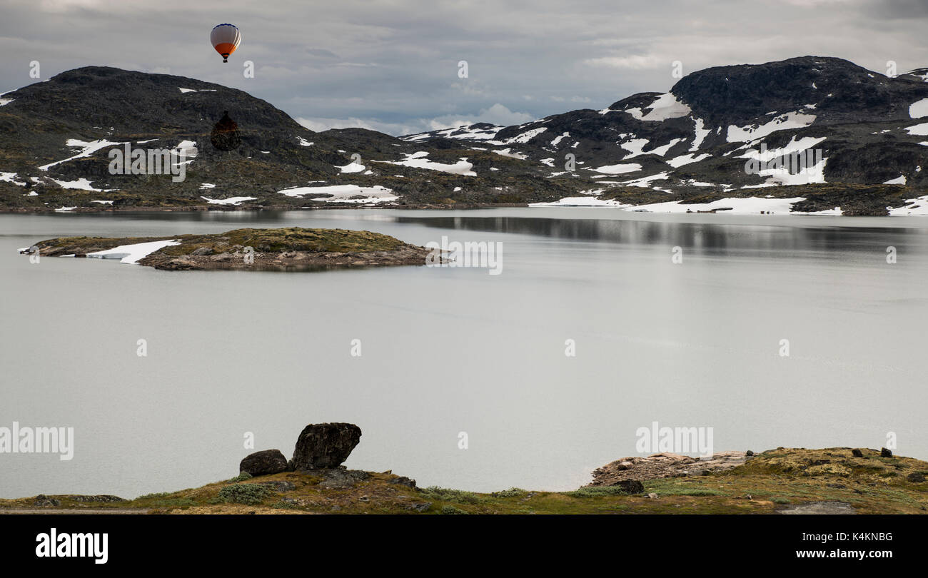 hot air balloon over the famous County Road 55. Highest mountain road ...