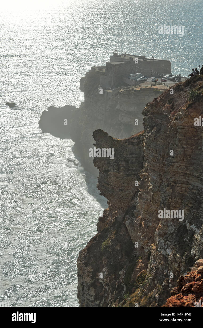View of the Lighthouse of Nazare (Nazareth) from the cliffs. Portugal ...