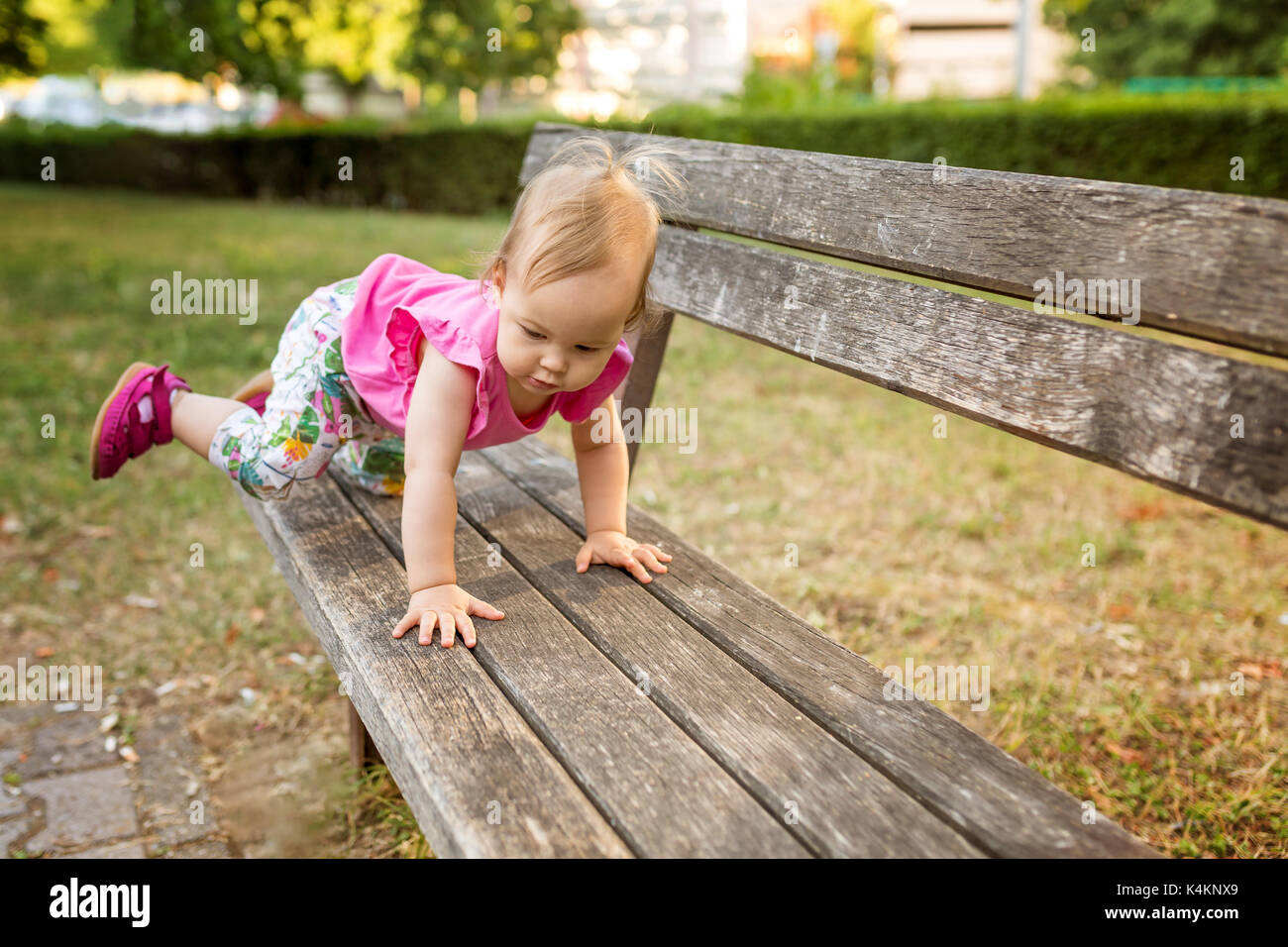 Kid climbing bench hi-res stock photography and images - Alamy
