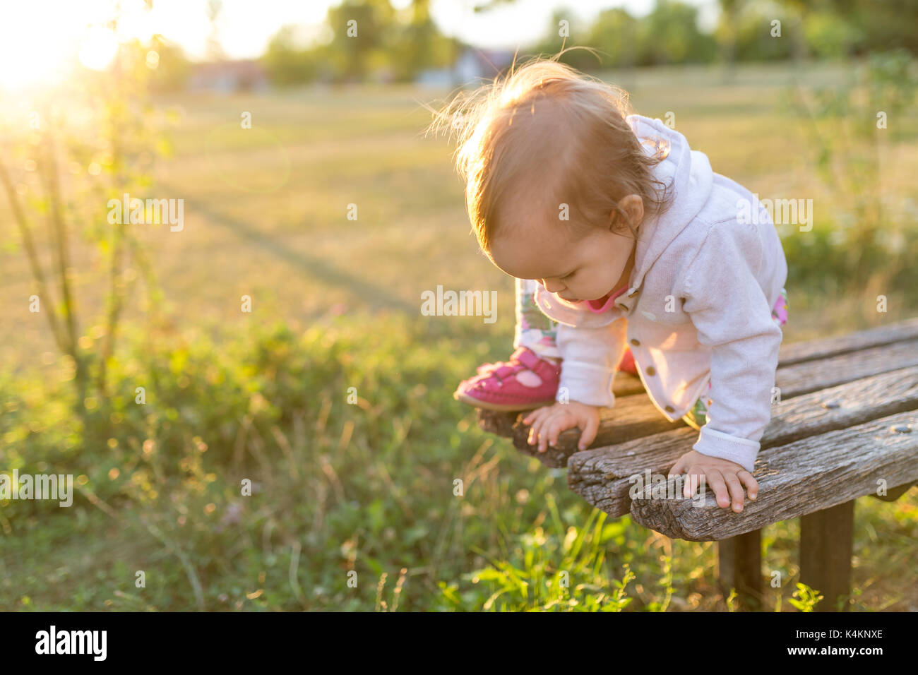 Baby climbing bench hi-res stock photography and images - Alamy