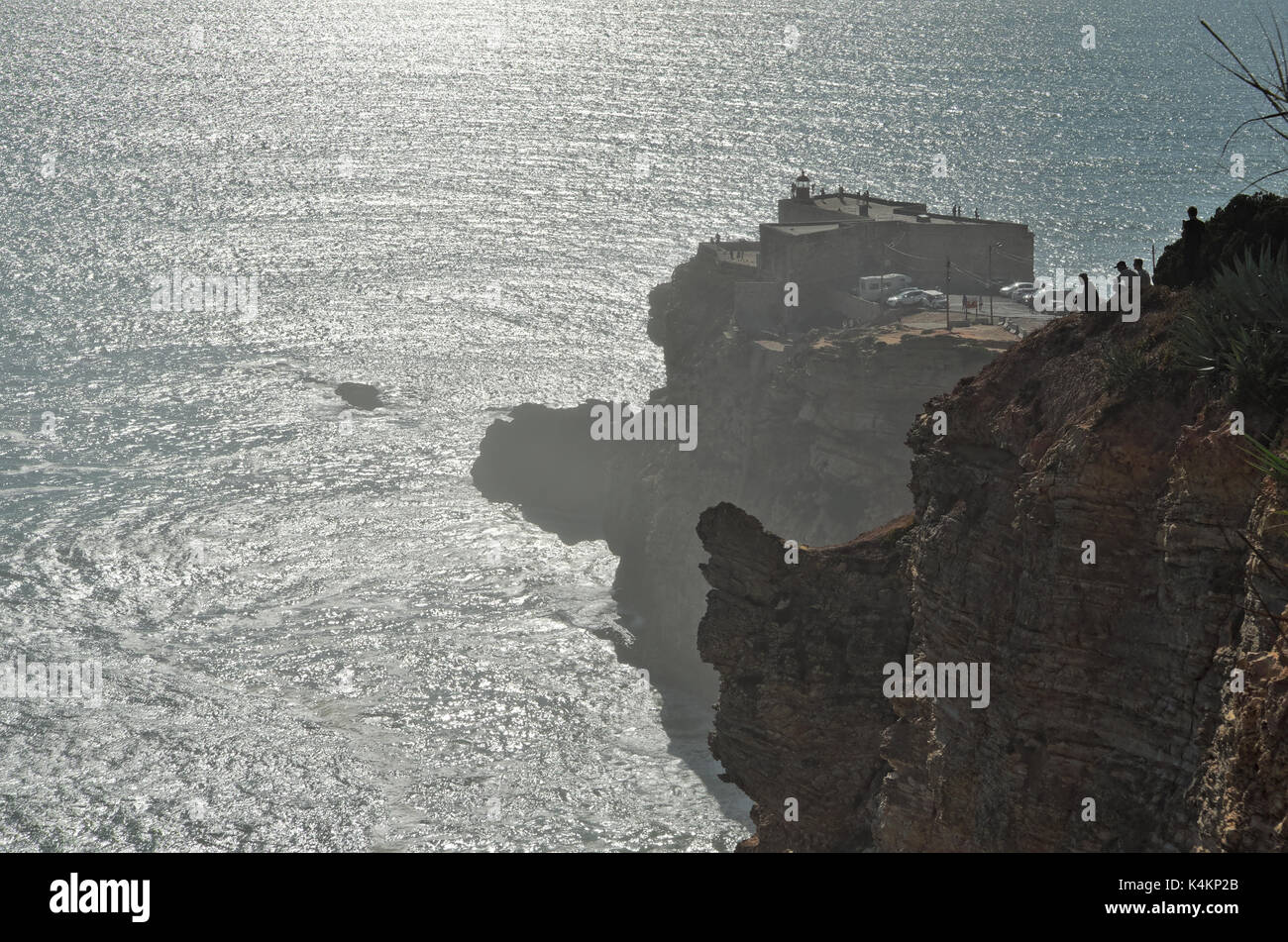 View of the Lighthouse of Nazare (Nazareth) from the cliffs. Portugal ...