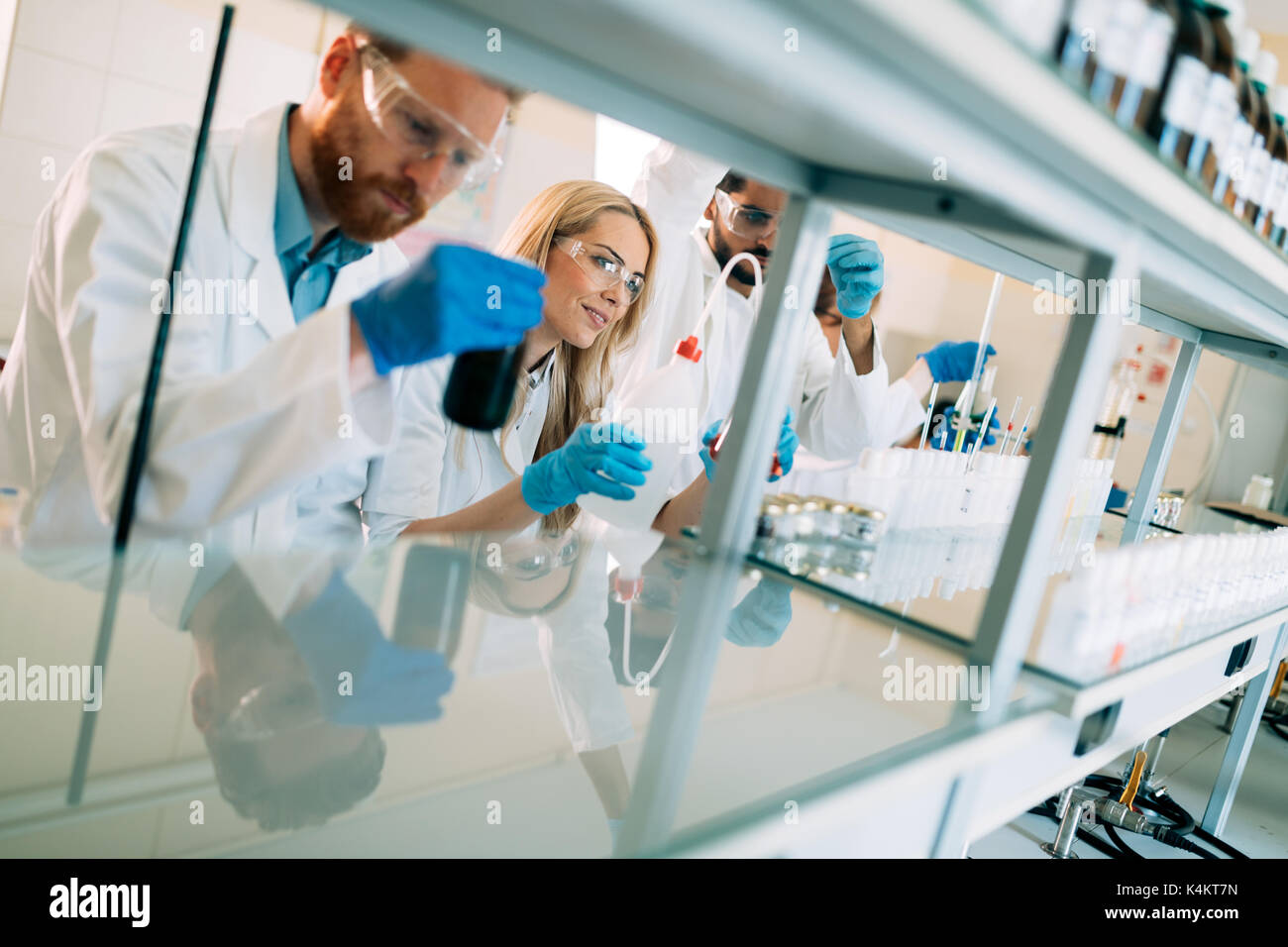 Young students of chemistry working in laboratory Stock Photo - Alamy