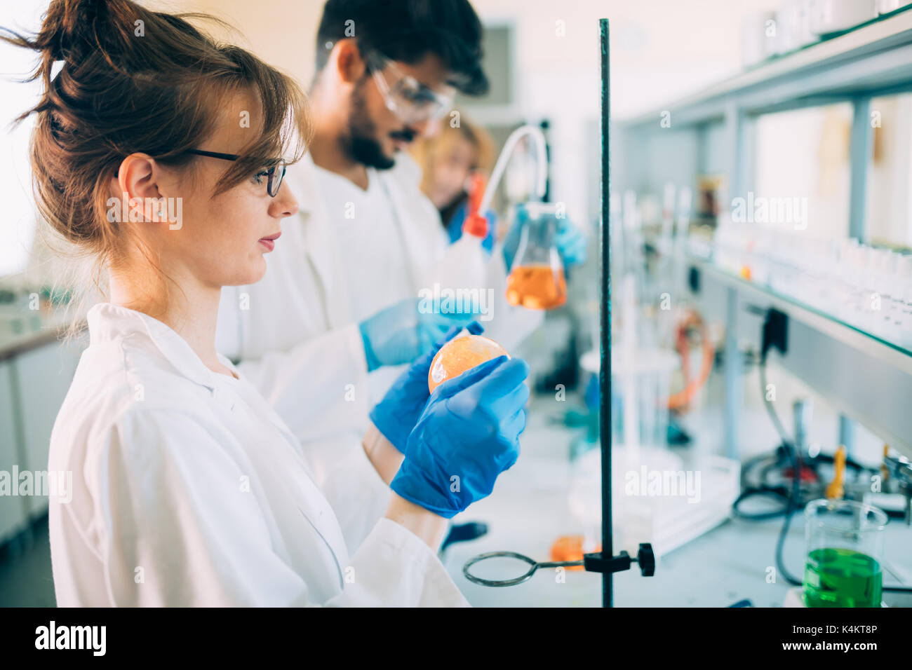 Student students lab coat hi-res stock photography and images - Alamy
