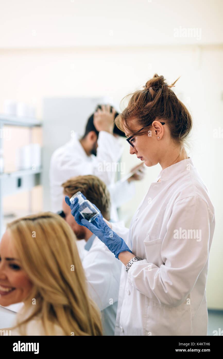 Female student of chemistry working in laboratory Stock Photo - Alamy