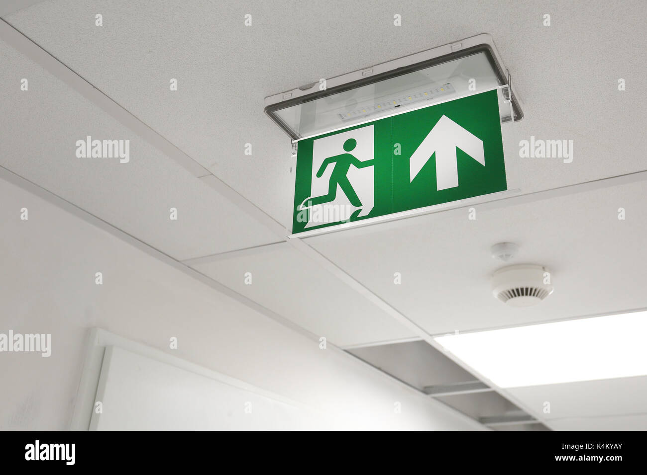 Emergency exit in office Stock Photo - Alamy