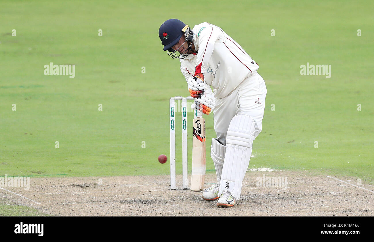 Lancashire's Jos Buttler is caught out from the bowling of Essex bowler ...