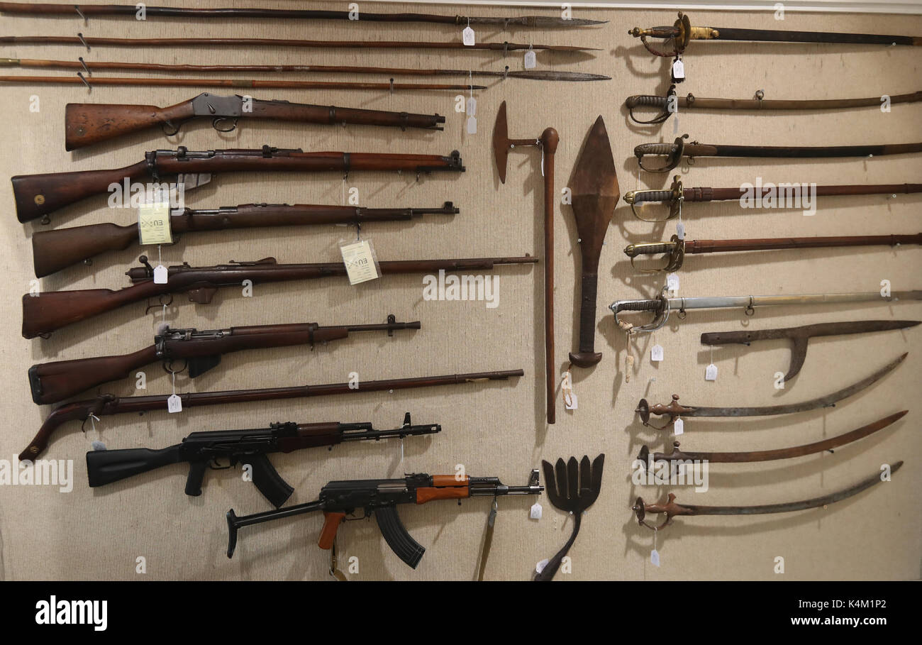 Various weapon on display during a preview of items in the Eclectic ...