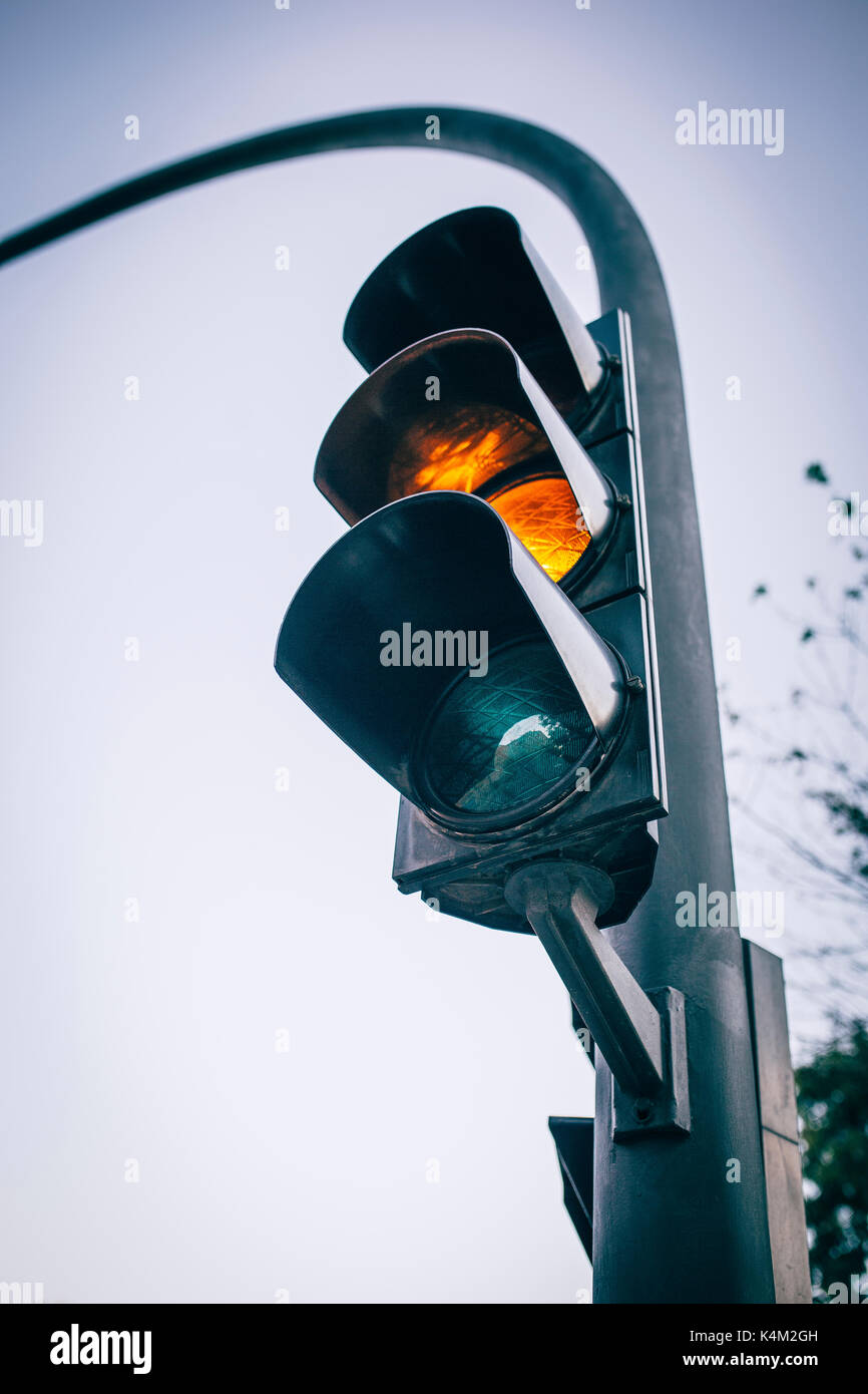 Semaphore in a amber color Stock Photo - Alamy