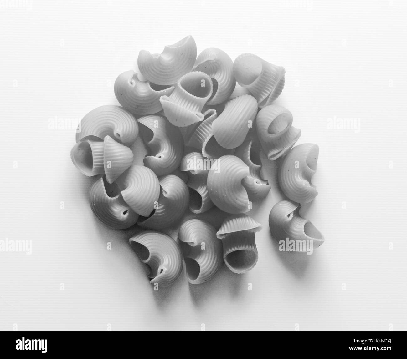 Italian penne pasta isolated Black and White Stock Photos & Images - Alamy