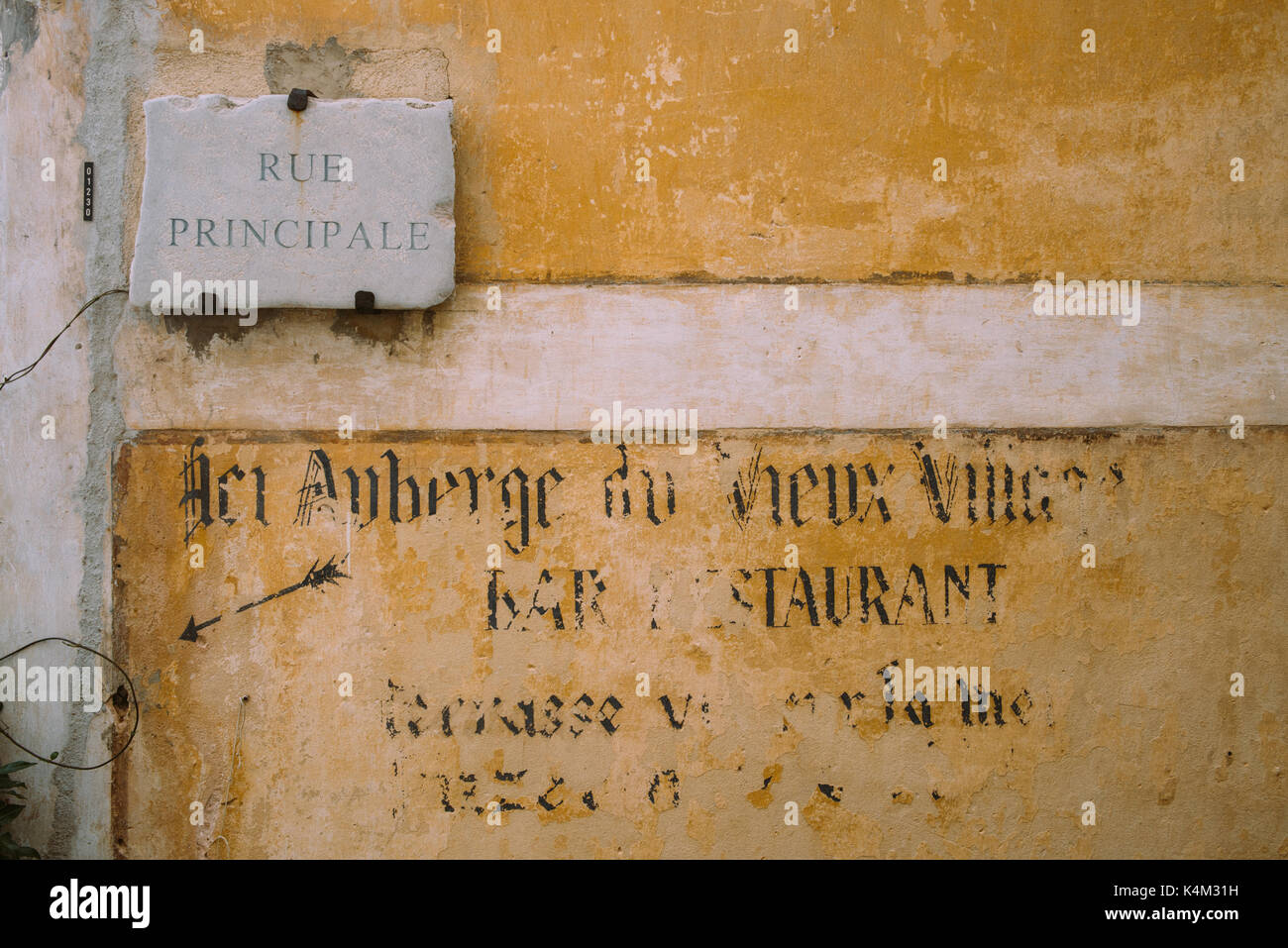 Faded writing on the wall - taken in Eze, Cote d'Azur, France Stock ...