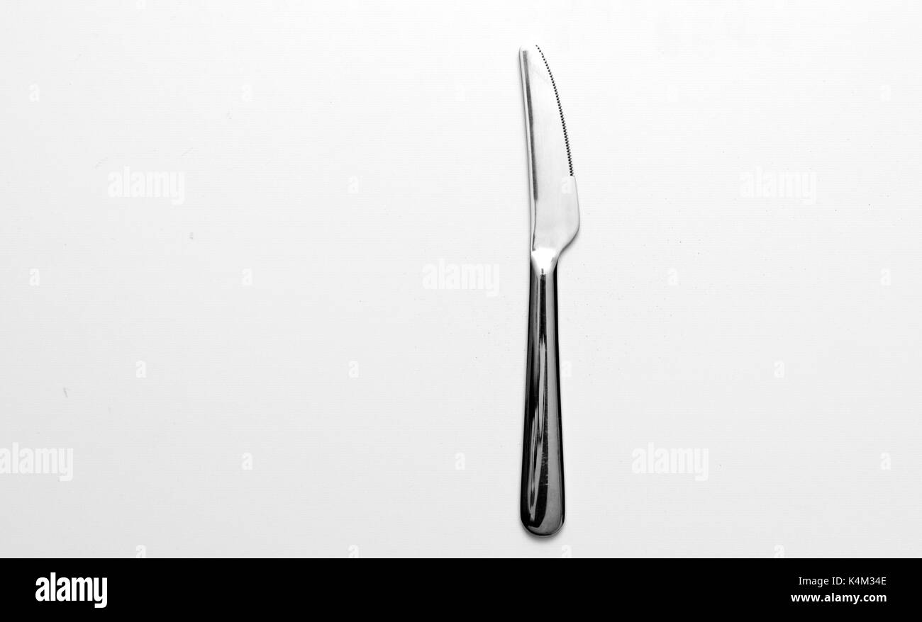 Holding knife fork Black and White Stock Photos & Images - Alamy