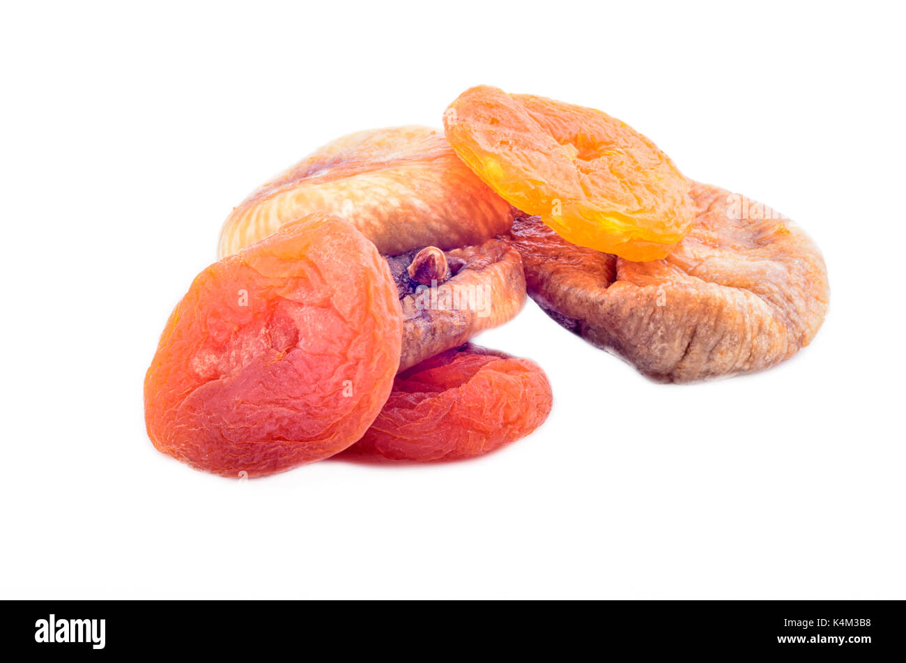 Dried apricots and figs isolated on white background Stock Photo - Alamy