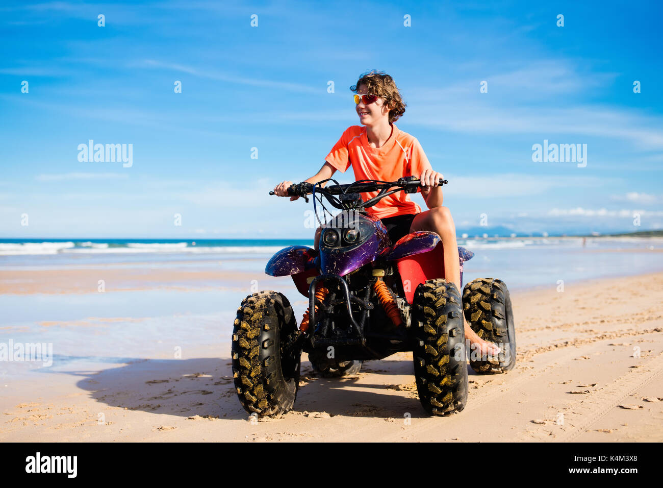 Teen riding quad atv four hi-res stock photography and images - Alamy