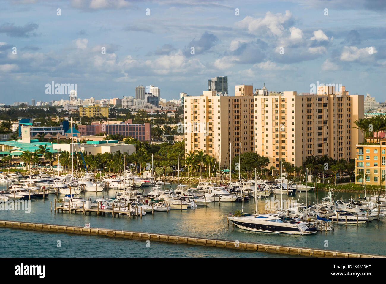 Tall coastal modern high-rise waterfront apartment blocks and holiday ...