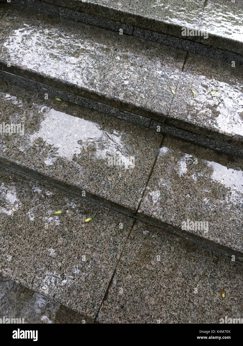 raindrops on granite steps of outdoor staircase during rain Stock Photo ...