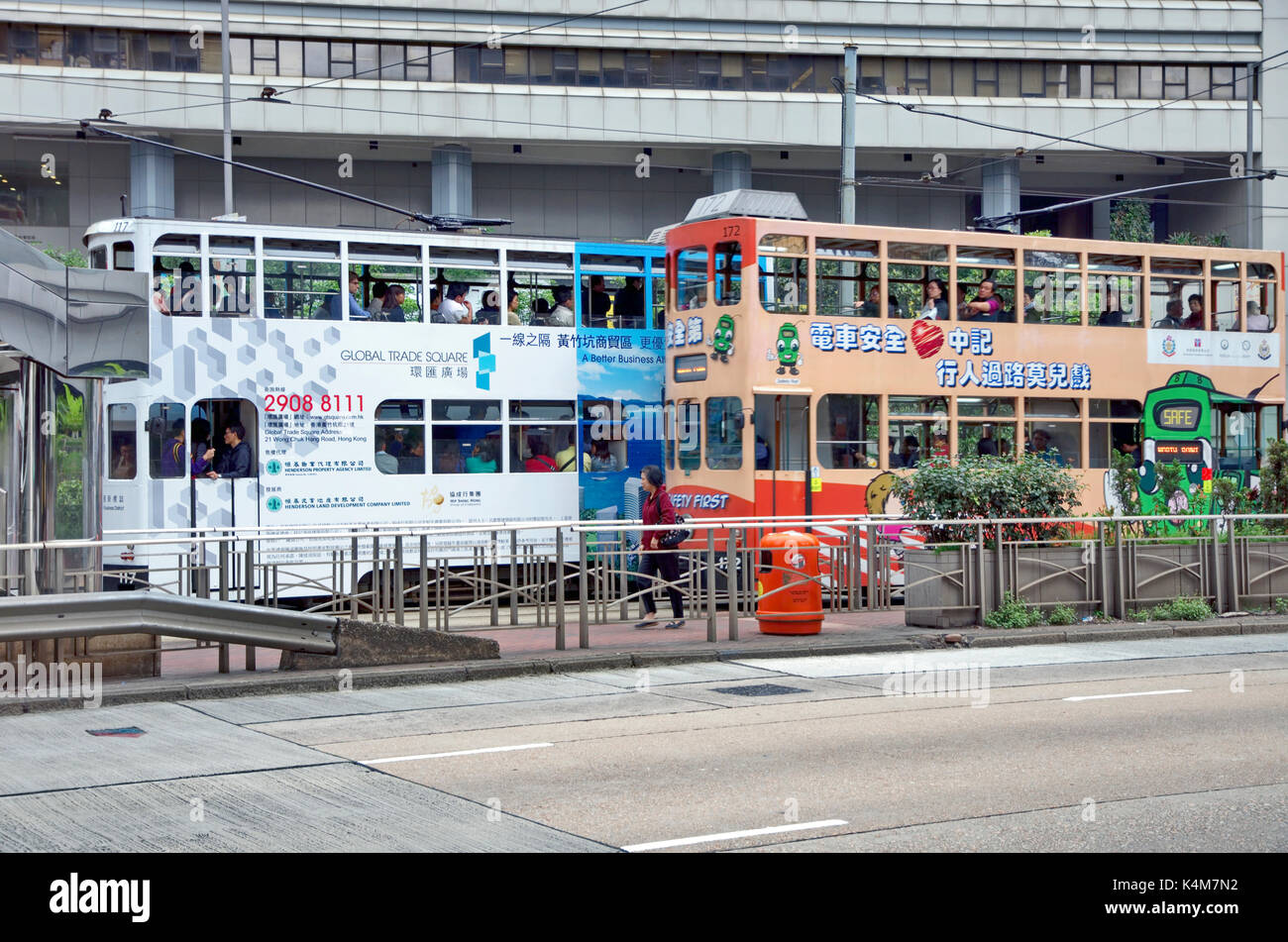 HONG KONG - MAY 04: Double-decker trams. Trams also a major tourist ...