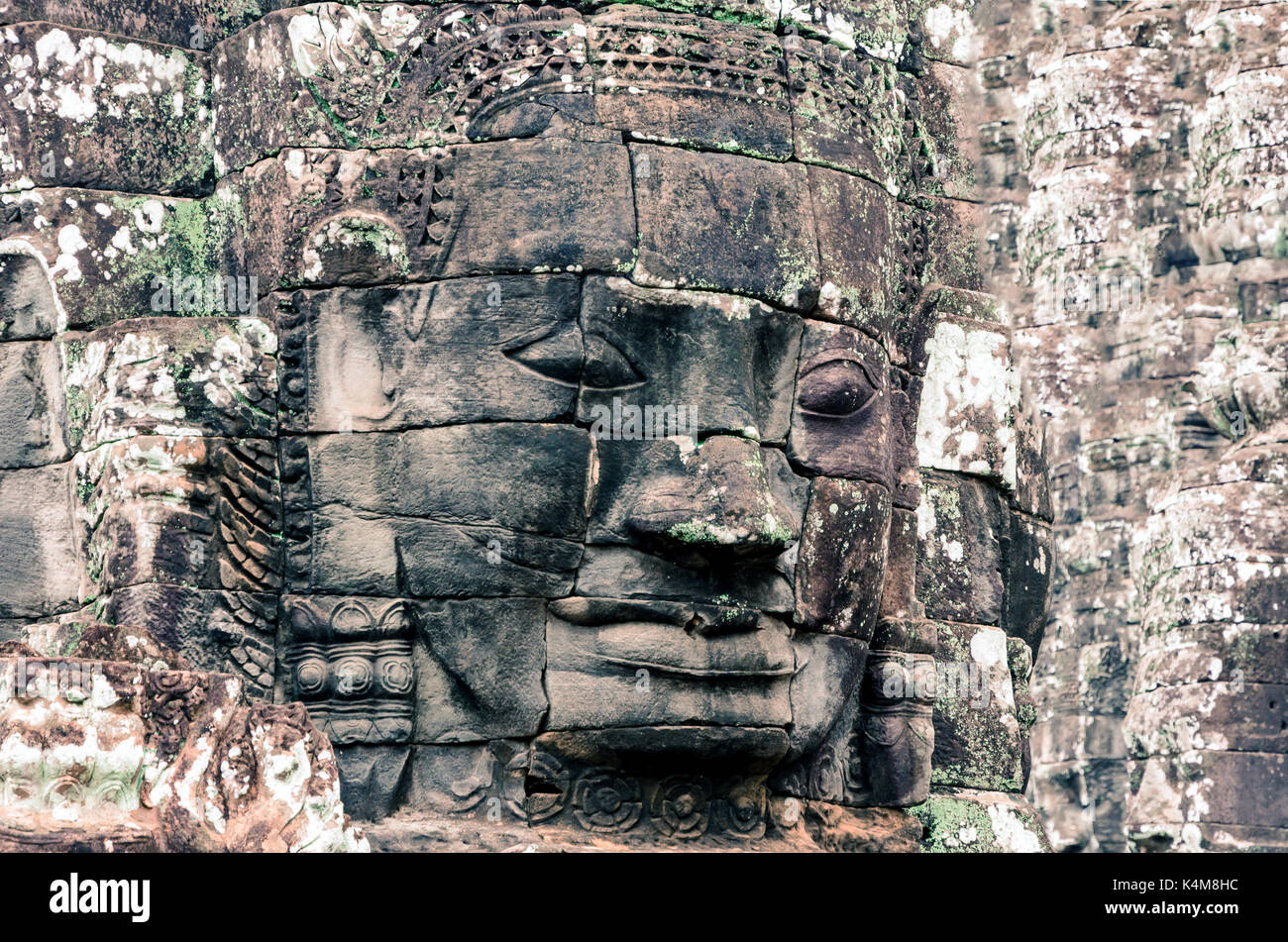Bayon temple faces Stock Photo - Alamy