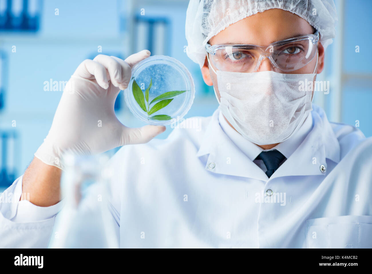 Biotechnology concept with scientist in lab Stock Photo - Alamy