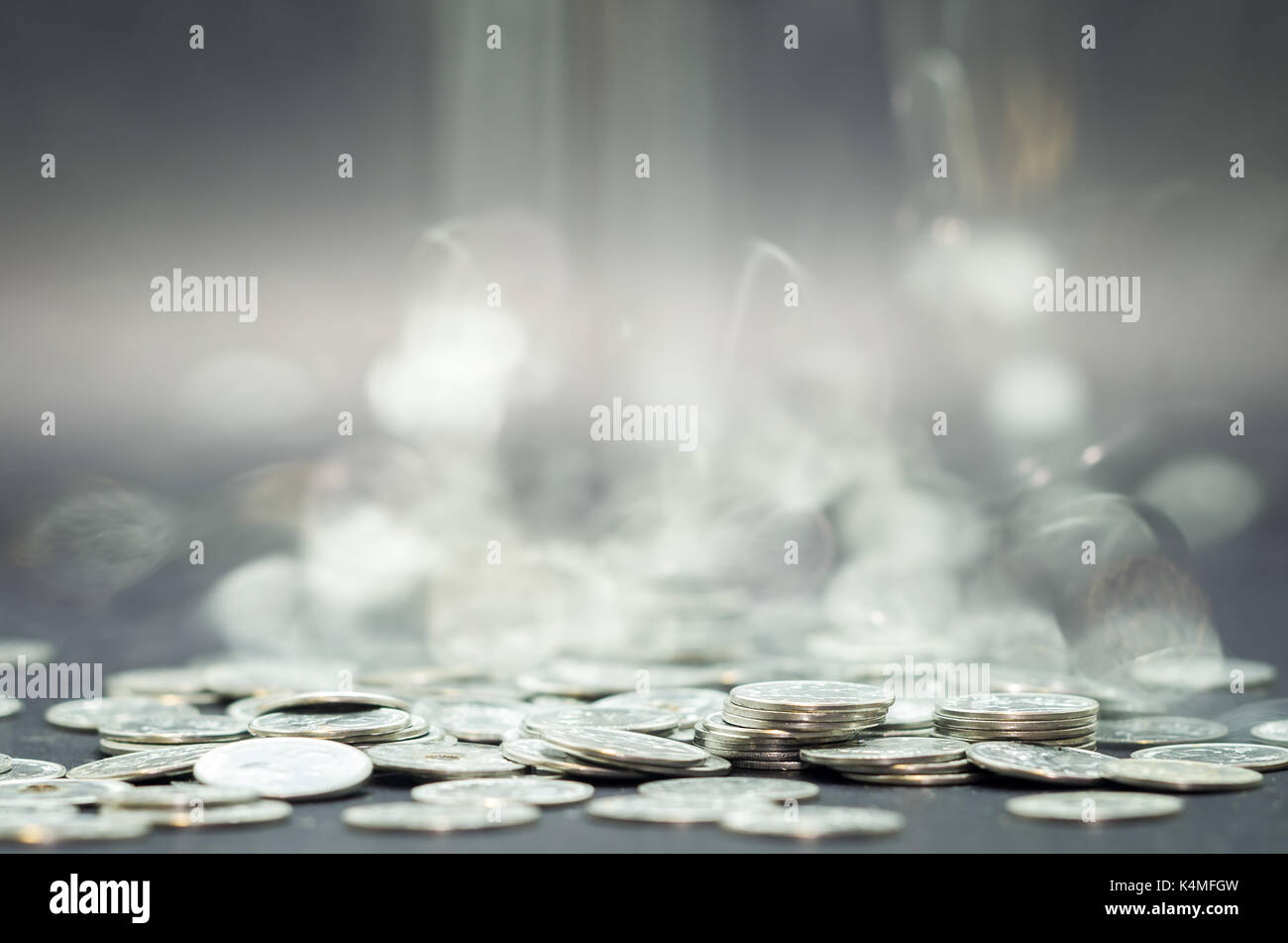 Silver Coins Falling High Resolution Stock Photography and Images - Alamy