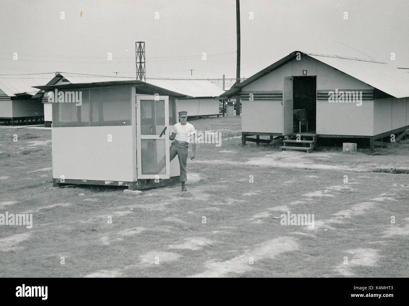 A United States Marine Corps member exists a latrine at the military ...