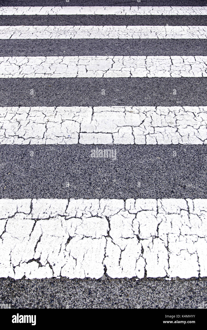 Zebra crossing to safely cross the street, detail of road safety ...