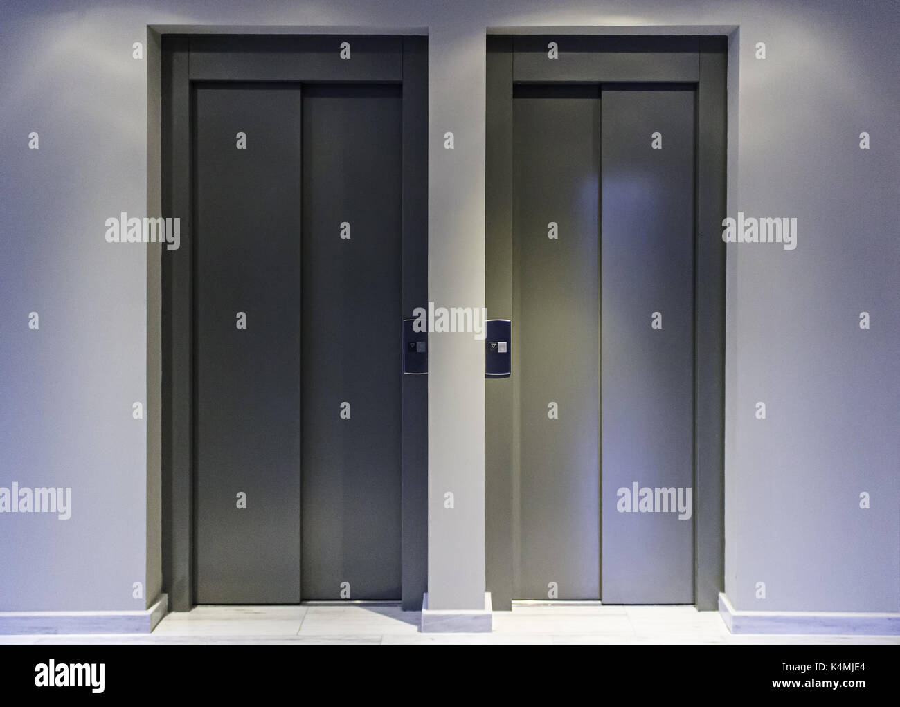 Doors of modern elevators in a building, transportation detail Stock ...