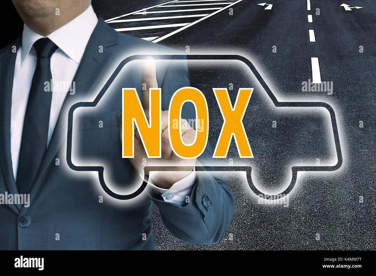 NOX with car touchscreen is operated by man concept Stock Photo - Alamy