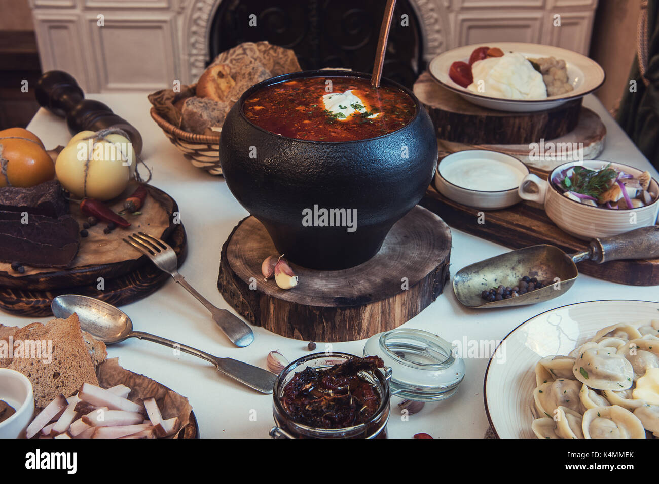 Russian food: borsch pickles cheese meat dumplings and fat Stock Photo ...