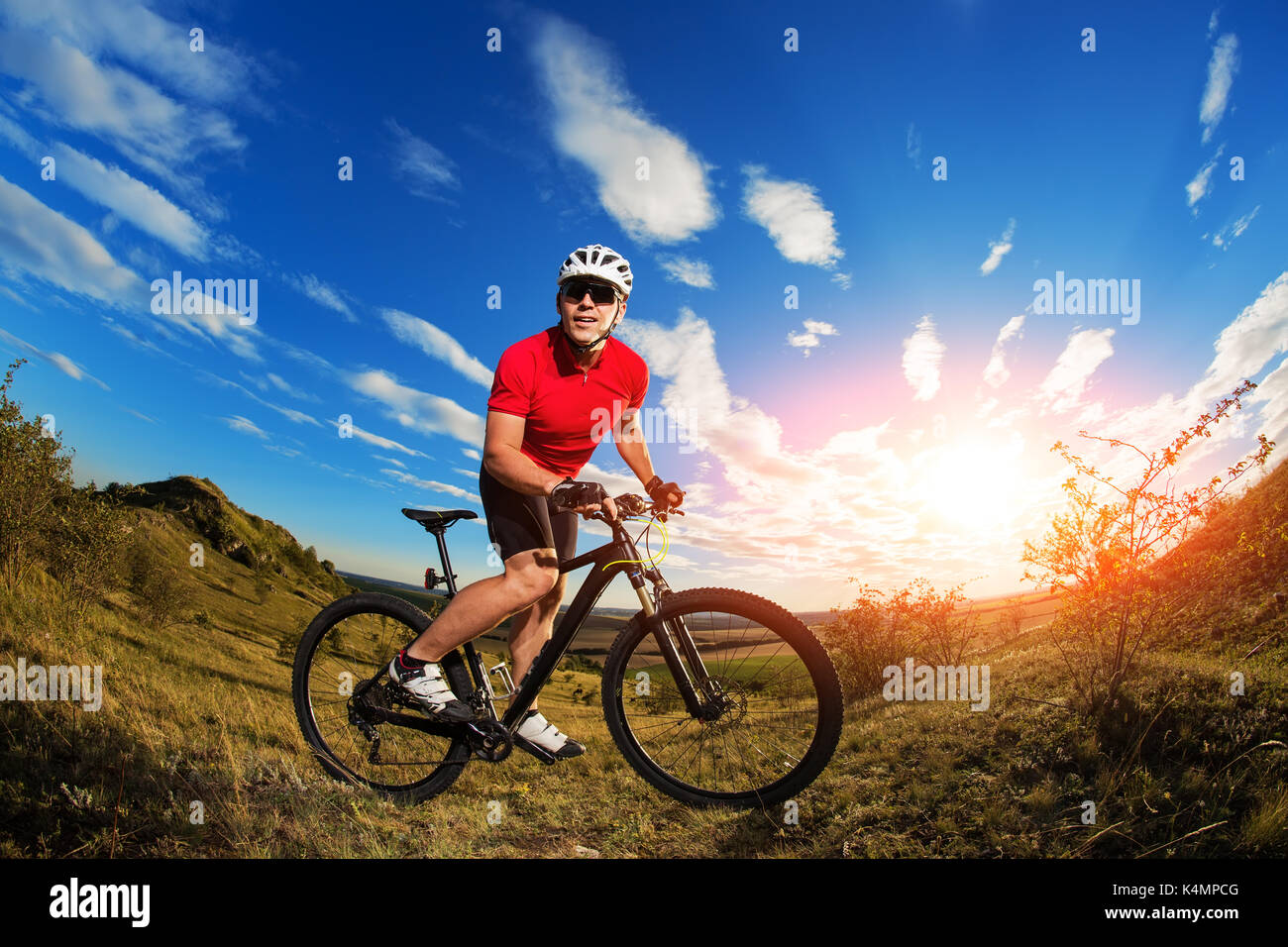 Biker tourist travel on mountain bike. Autumn landscape. Sportsman on ...