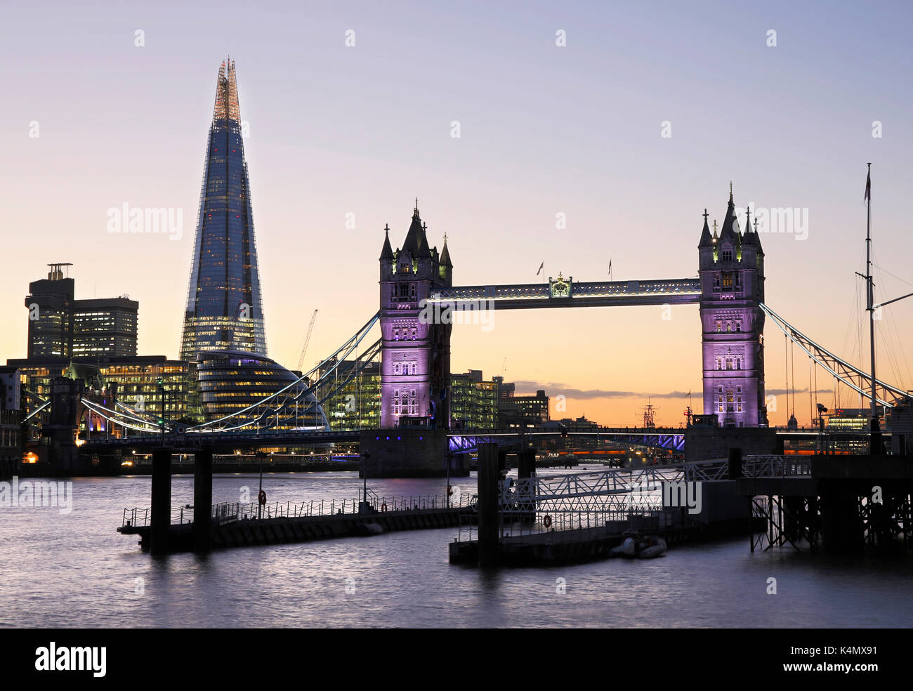 Tower Bridge and The Shard illuminated at night, London, England ...