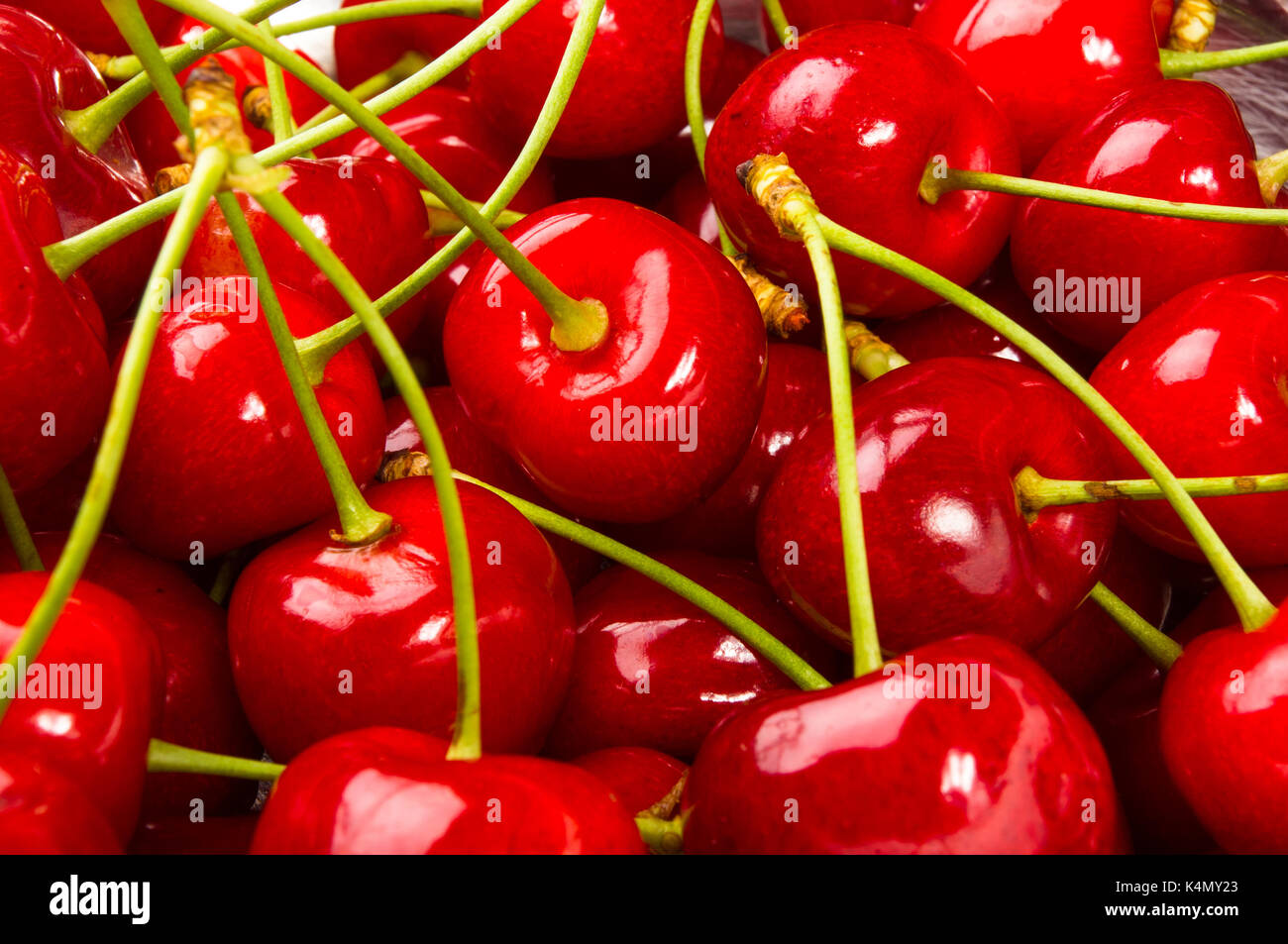 large ripe red cherries in a dish of stainless steel, close-up Stock ...
