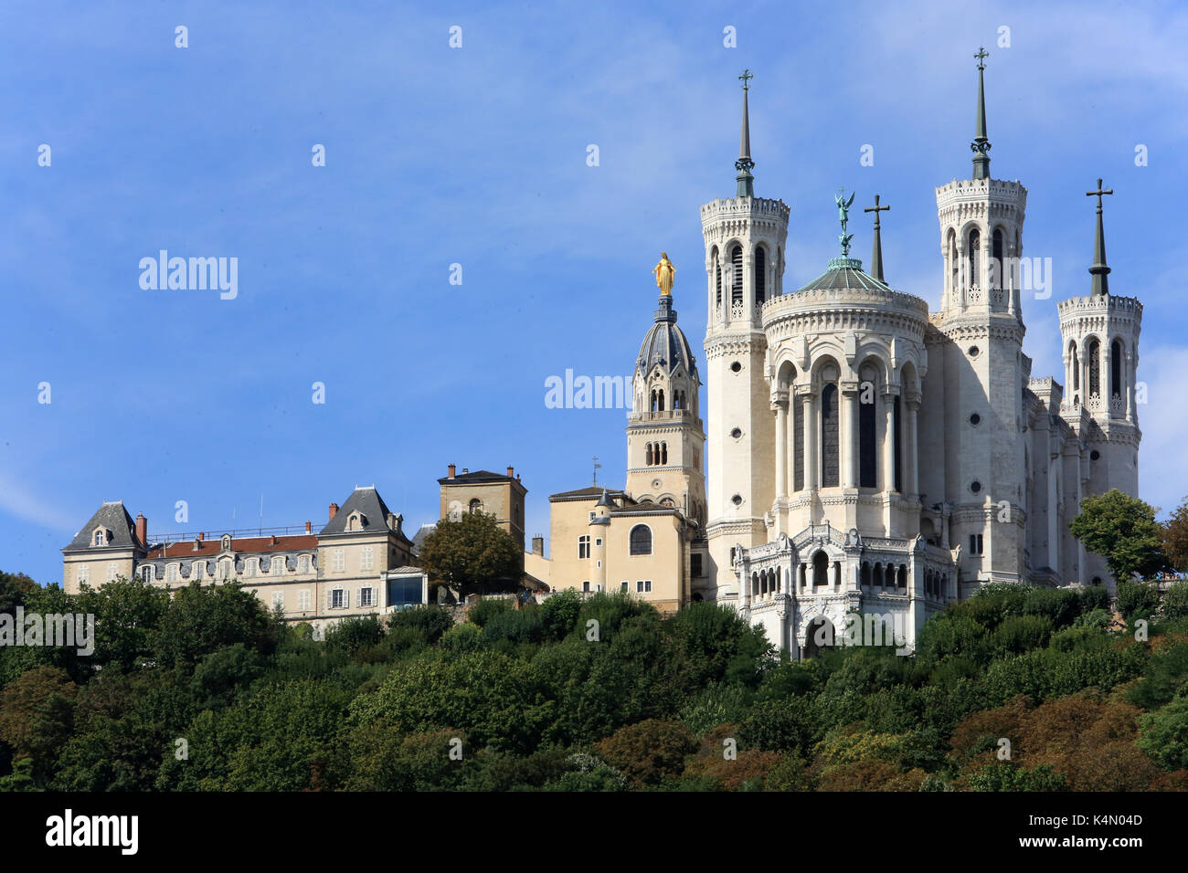 Basilica of Notre-Dame de Fourviere with its four crenellated octagonal ...
