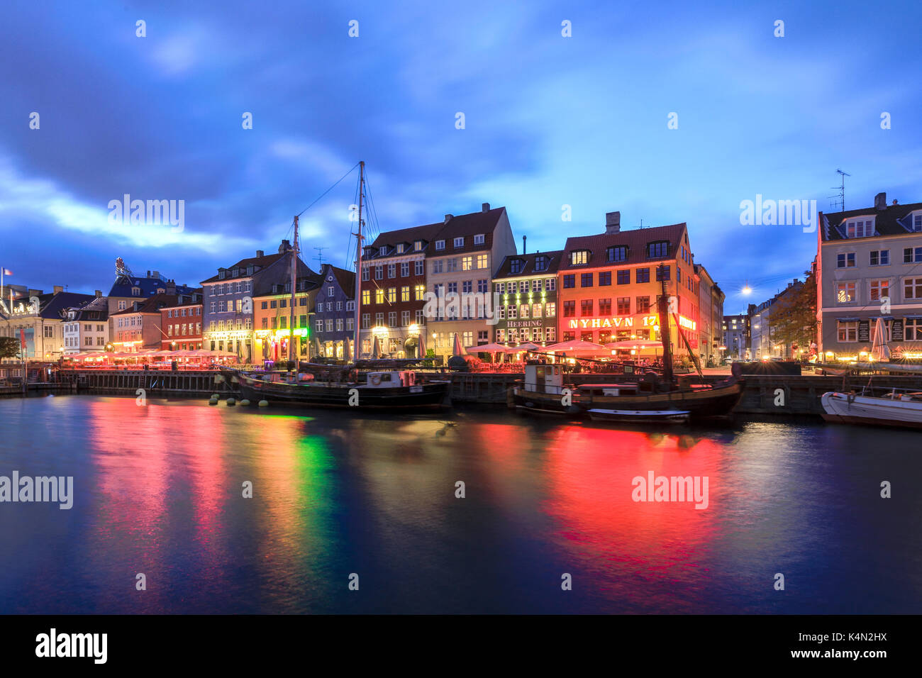 Night view of the illuminated harbour and canal of the entertainment ...