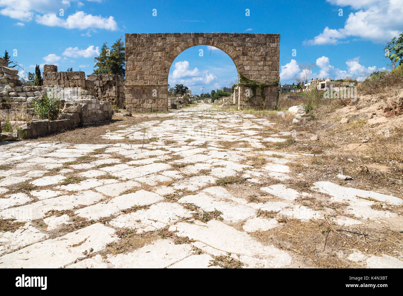 Byzantine road with triumph arch in ruins of Tyre, Lebanon Stock Photo ...