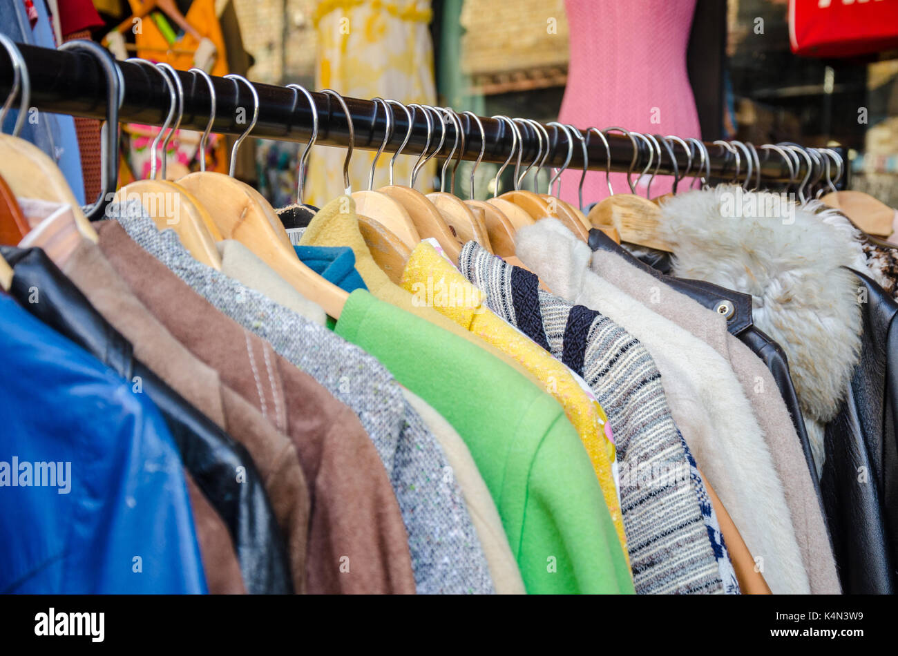 Hangers on hanging rail hi-res stock photography and images - Alamy