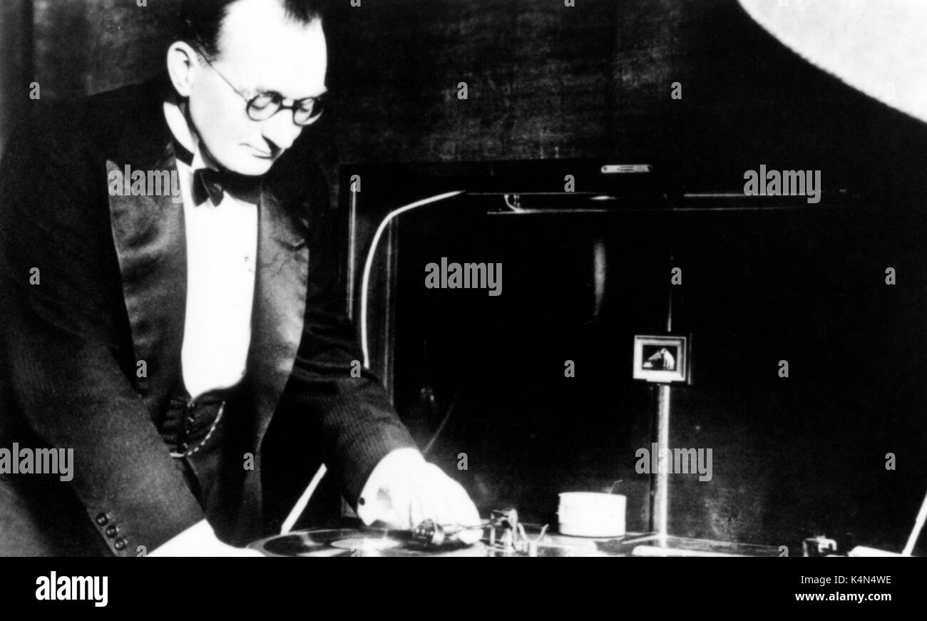Christopher Stone playing an early record player / gramophone ...