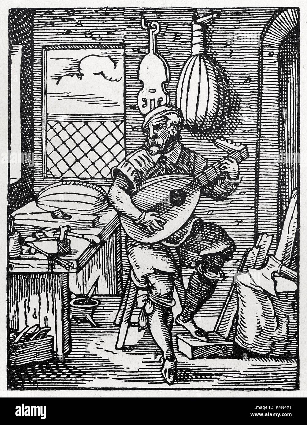 Luthier (lute maker) playing lute in his workshop. From Joost Amman 's ...