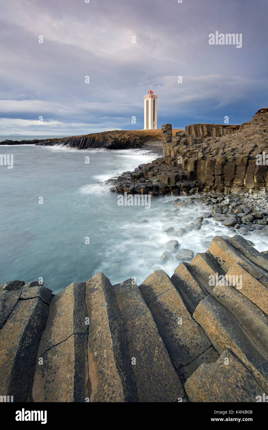 Basalt columns and the Kálfshamarsvík lighthouse near Skagaströnd on ...
