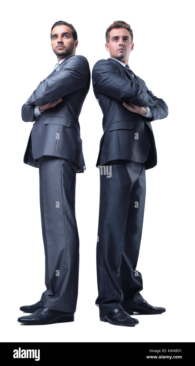 two business partners standing back to back Stock Photo - Alamy