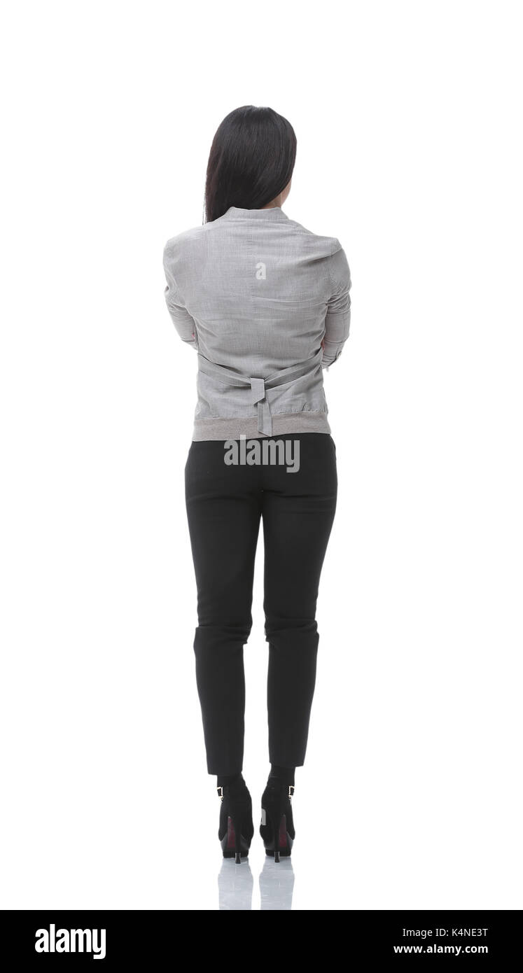 back view. In full growth. Portrait of a modern young woman Stock Photo ...