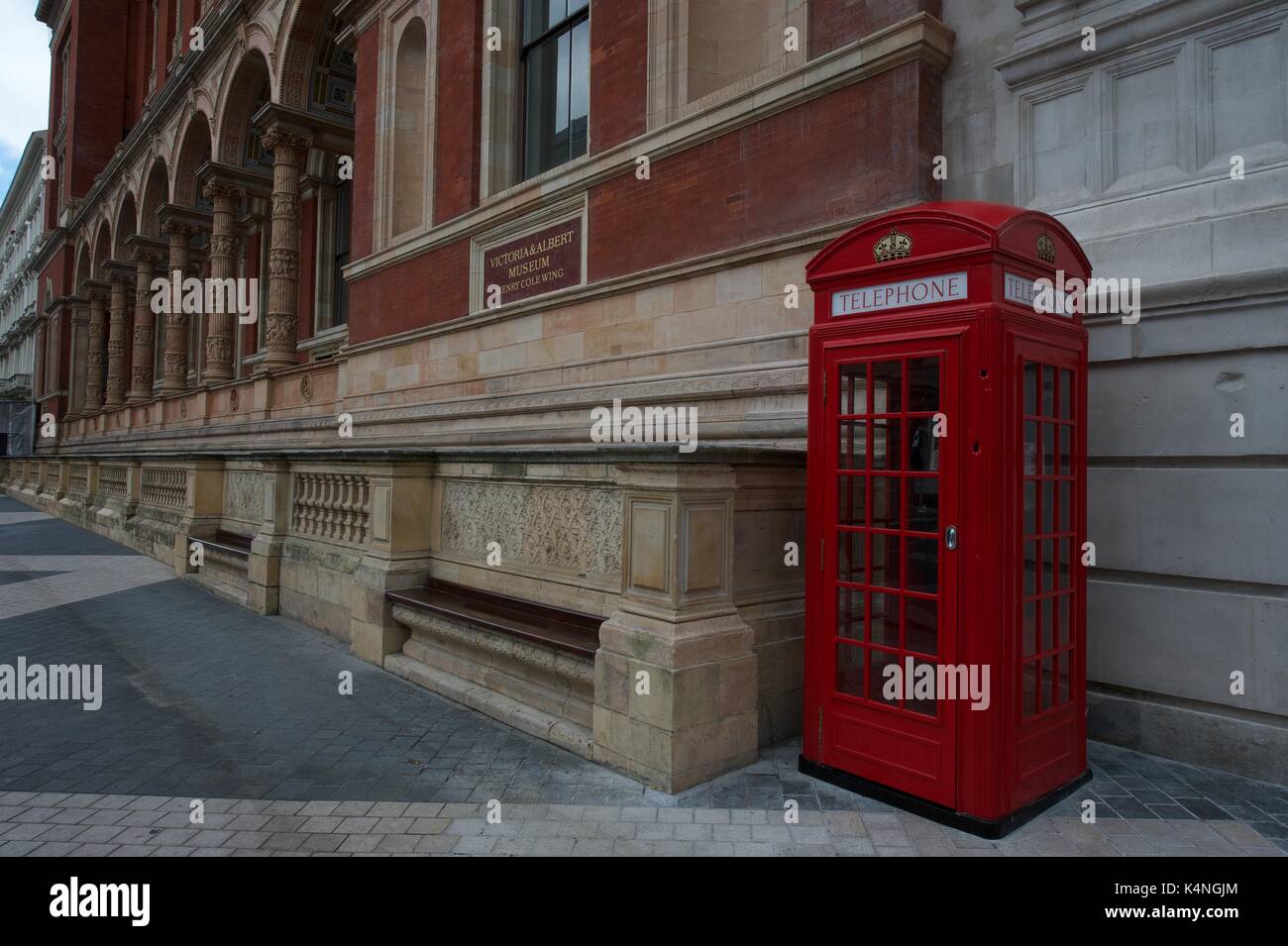 Classic Red telephone box outside V&A london Stock Photo - Alamy