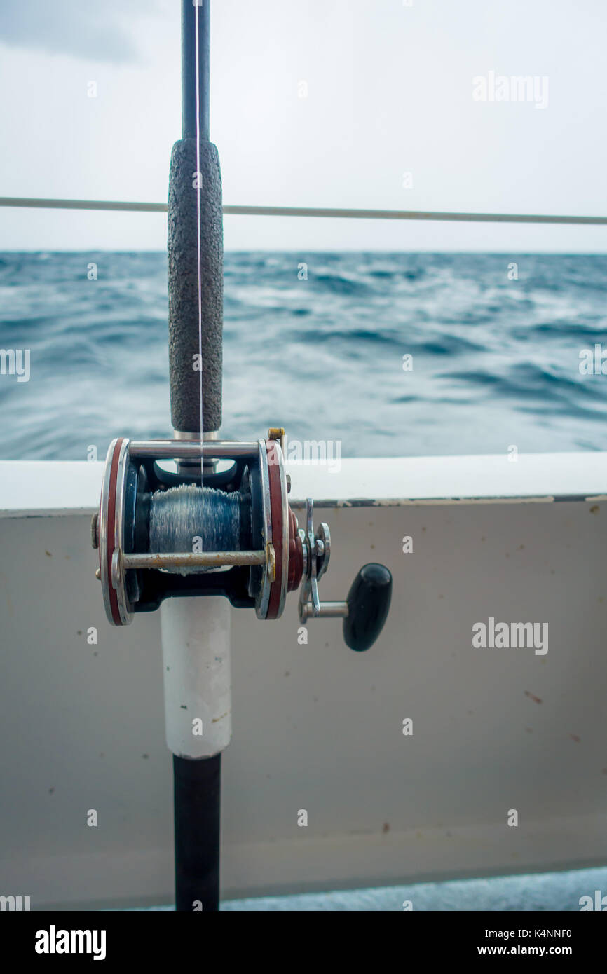 Close up of a fishing rod in a big boat in the water at Fort Lauderdale ...