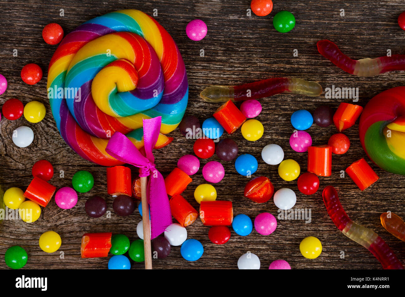 Colorful candies on wood Stock Photo - Alamy